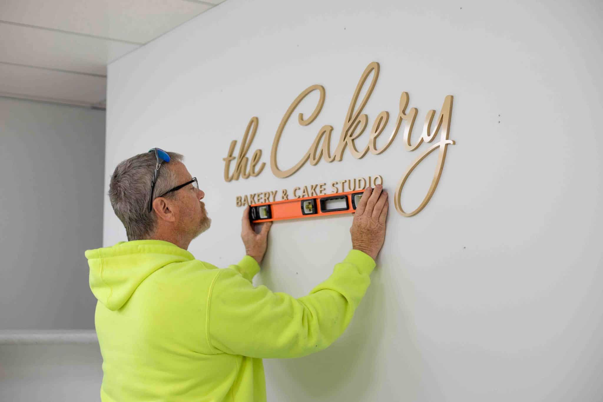 The Cakery Bakery Sign Install - Engraphix Architectural Signage, Inc.