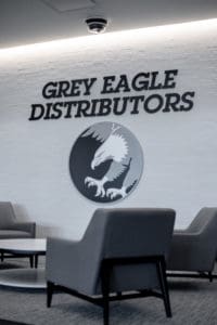 Grey Eagle Distributors Lobby Signage - Engraphix Architectural Signage ...